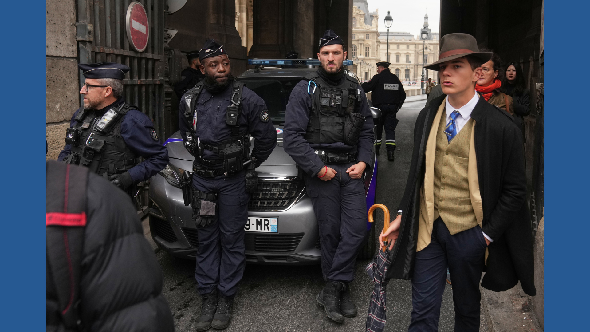 Inspector Clouseau? The mystery man in an AP photo after the Louvre ...