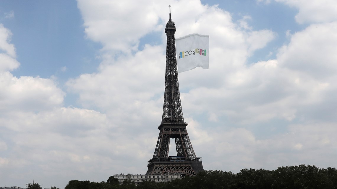 Paris: World's biggest flag on Eiffel Tower in Olympics handoff ...