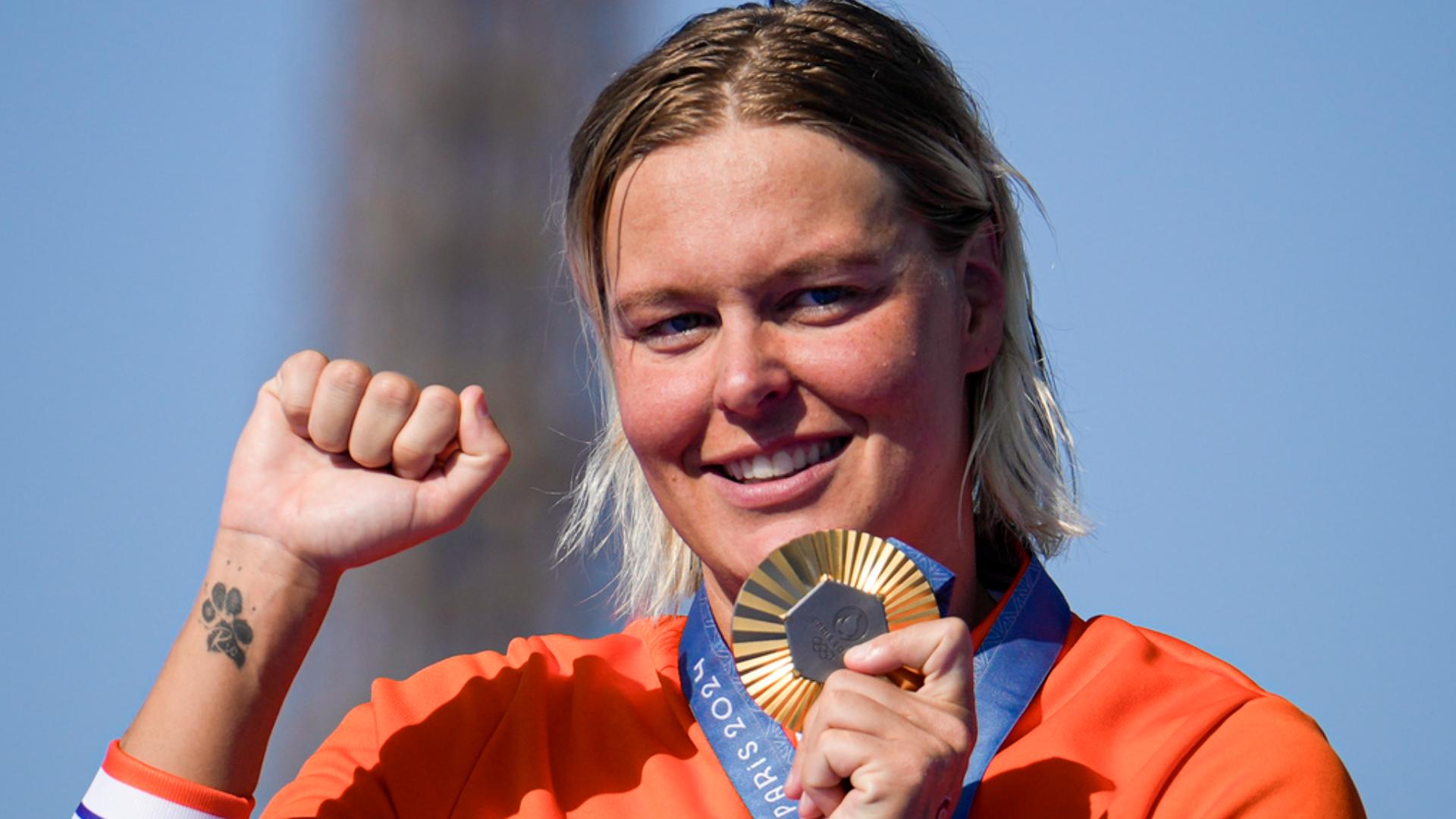 Netherlands' marathon swimmer dedicates gold medal to late dog ...