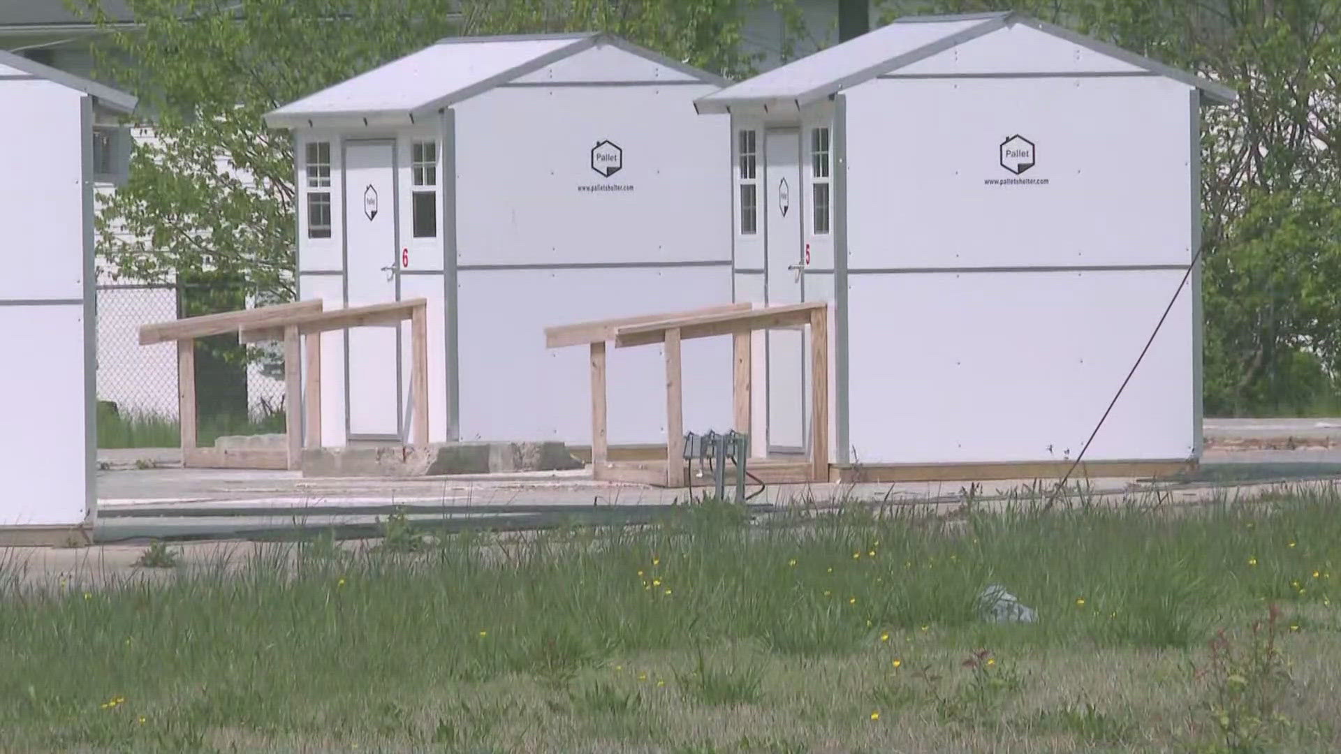 Greensboro’s temporary homeless shelter community moving to new site ...