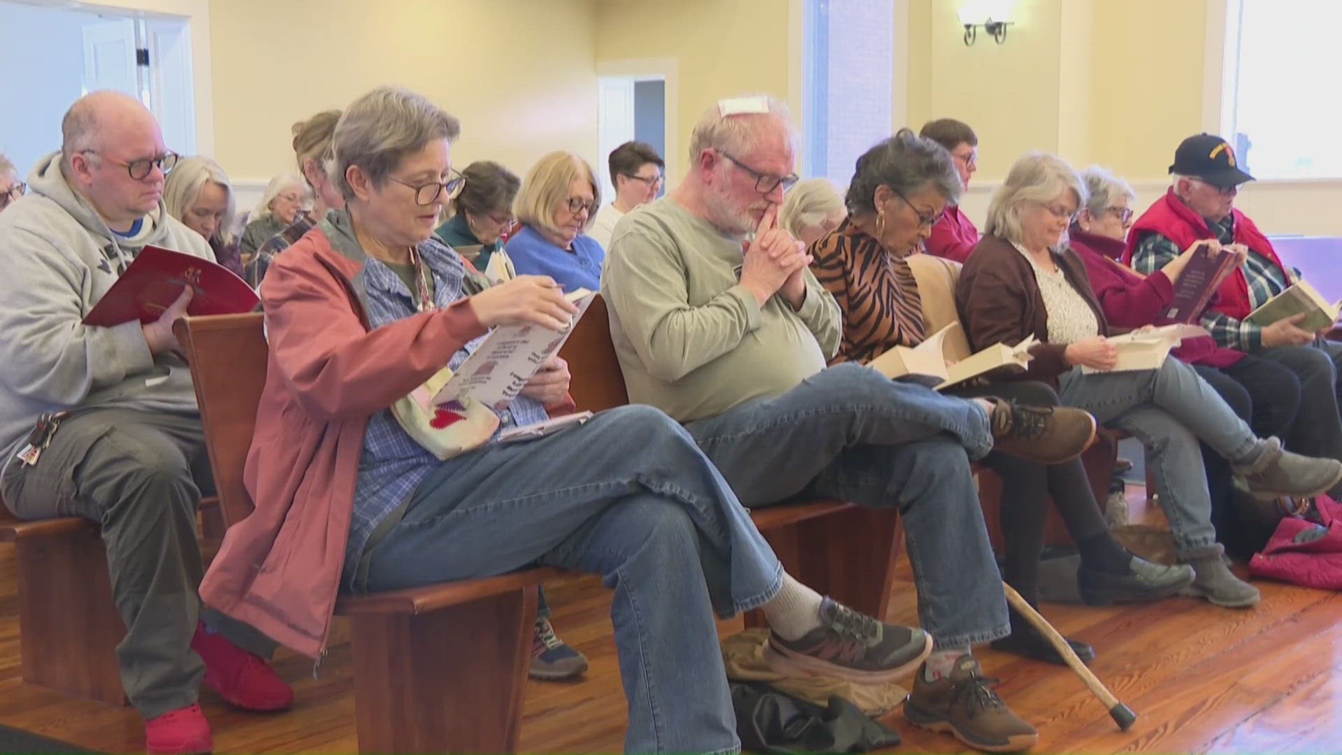 Randolph County residents silently protest over library board dismissal ...