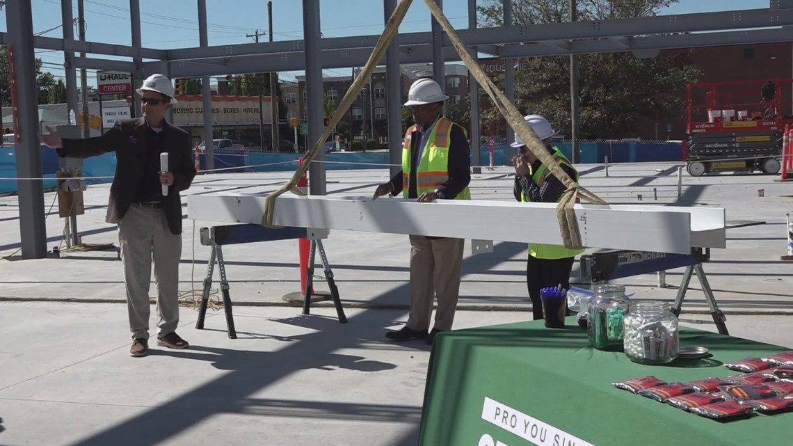UNC Greensboro holds beam signing for new campus building | wfmynews2.com