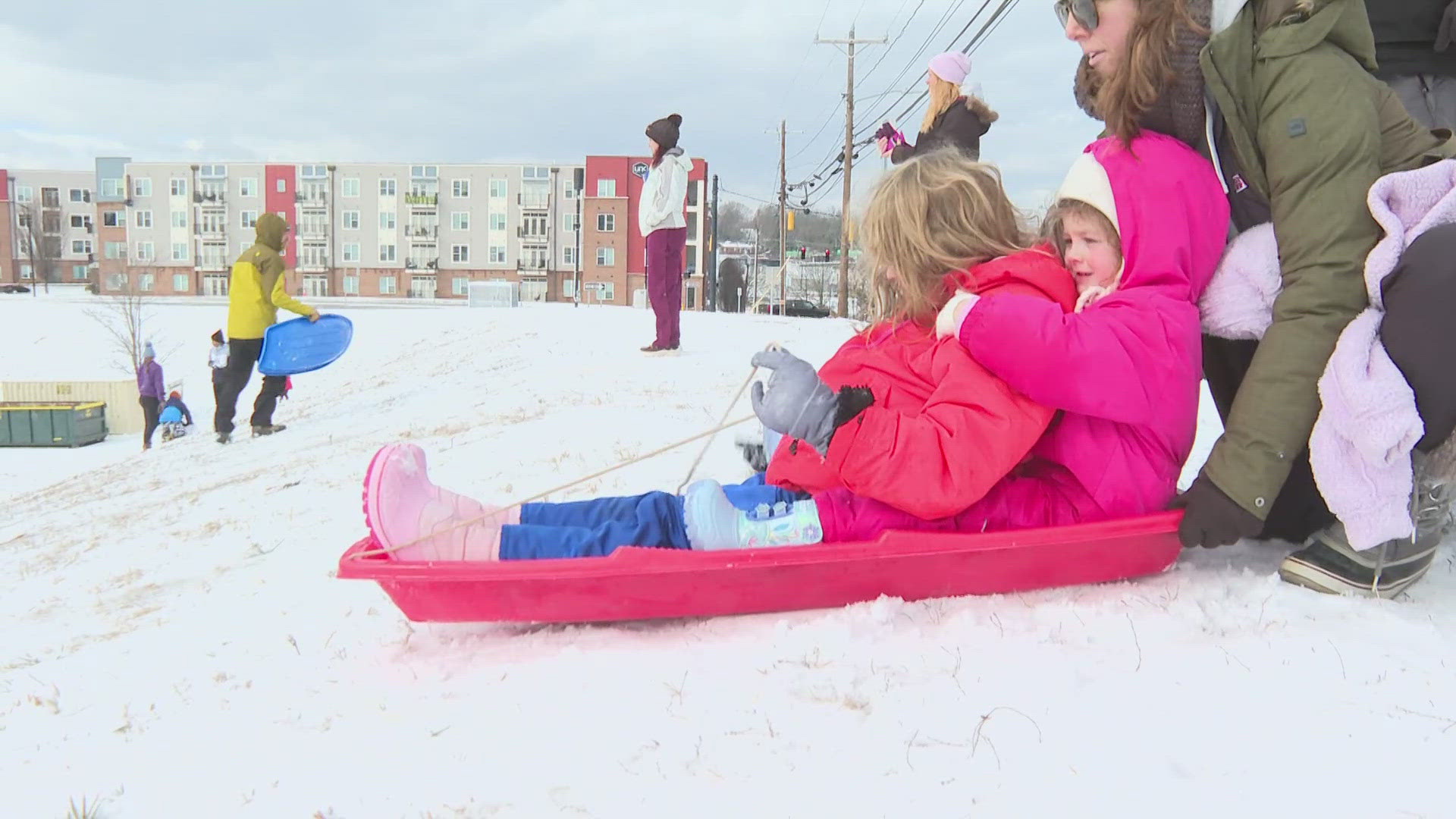 Community members enjoy the snow in Winston-Salem | wfmynews2.com
