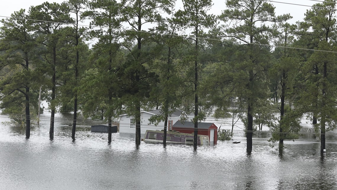 Pollution fears: Swollen rivers swamp ash dumps, hog farms | wfmynews2.com