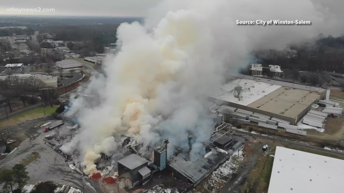 Neighbors worry as factory fire continues to burn | wfmynews2.com