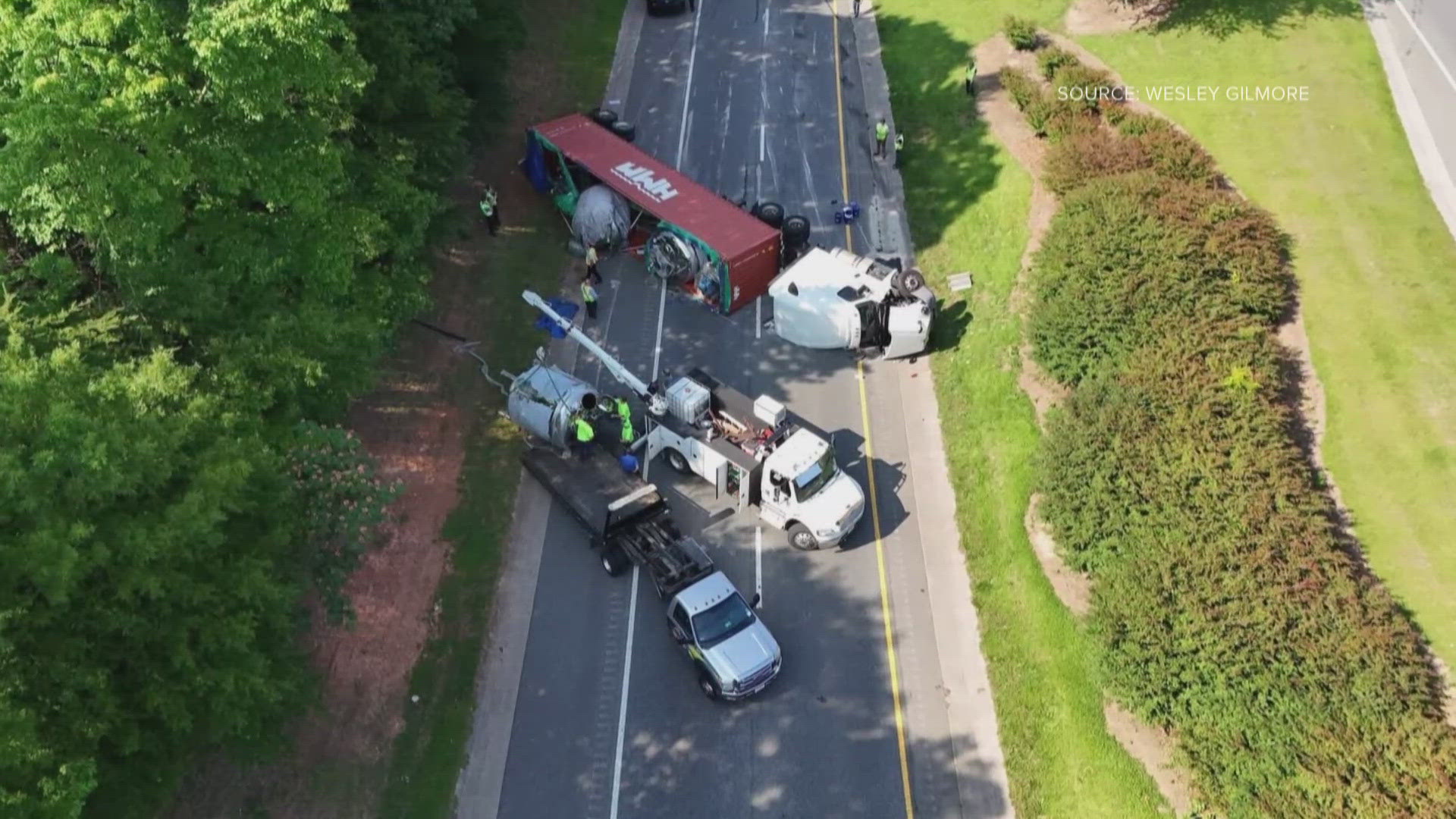 Overturned tractor-trailer shuts down part of I-73, causes damage to bridge | wfmynews2.com