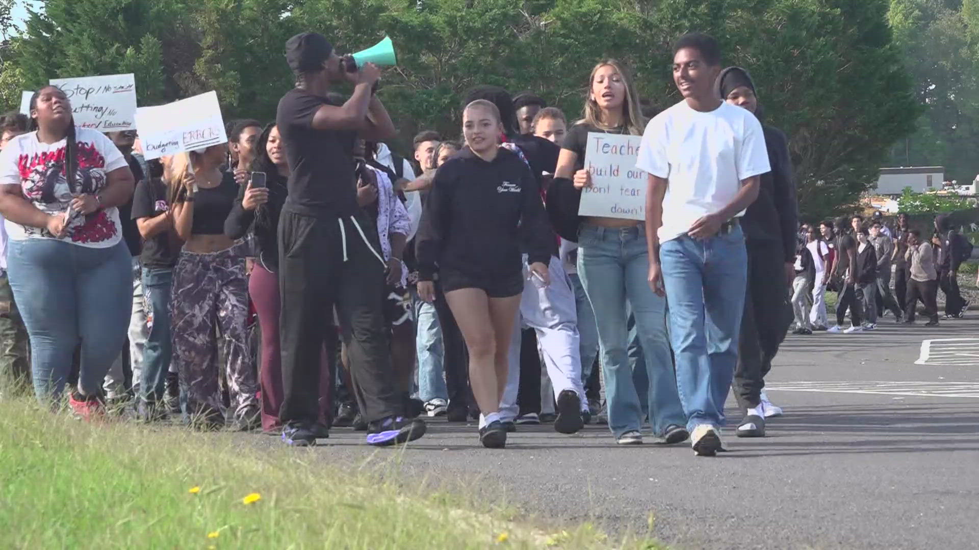 Glenn High School students walk out over WS/FCS job cuts | wfmynews2.com