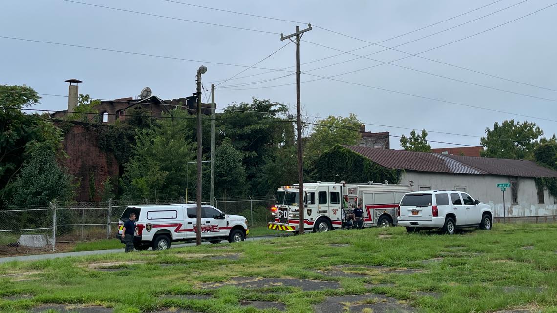 Firefighters battle two-alarm blaze at old Graham textile mill ...