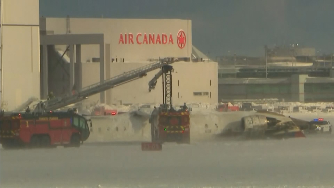 Delta flight crashes at Toronto Airport after landing, flips upside ...