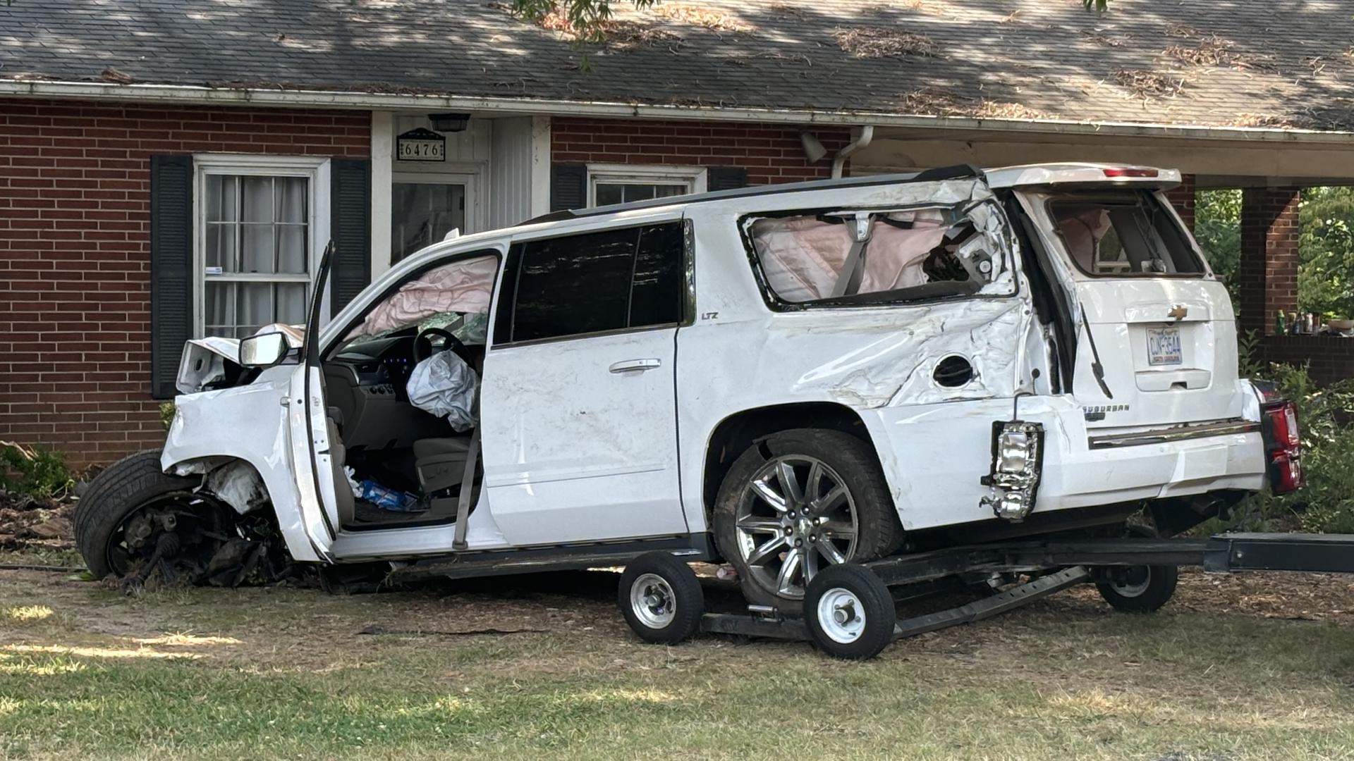 Car crashes into several yards before stopping in front of home ...