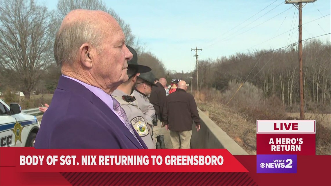 Alamance Co. Sheriff Terry Johnson awaiting the procession to pass ...