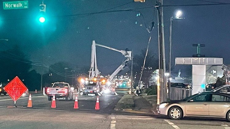 Car crash causes damage to two utility poles, downed powerlines ...