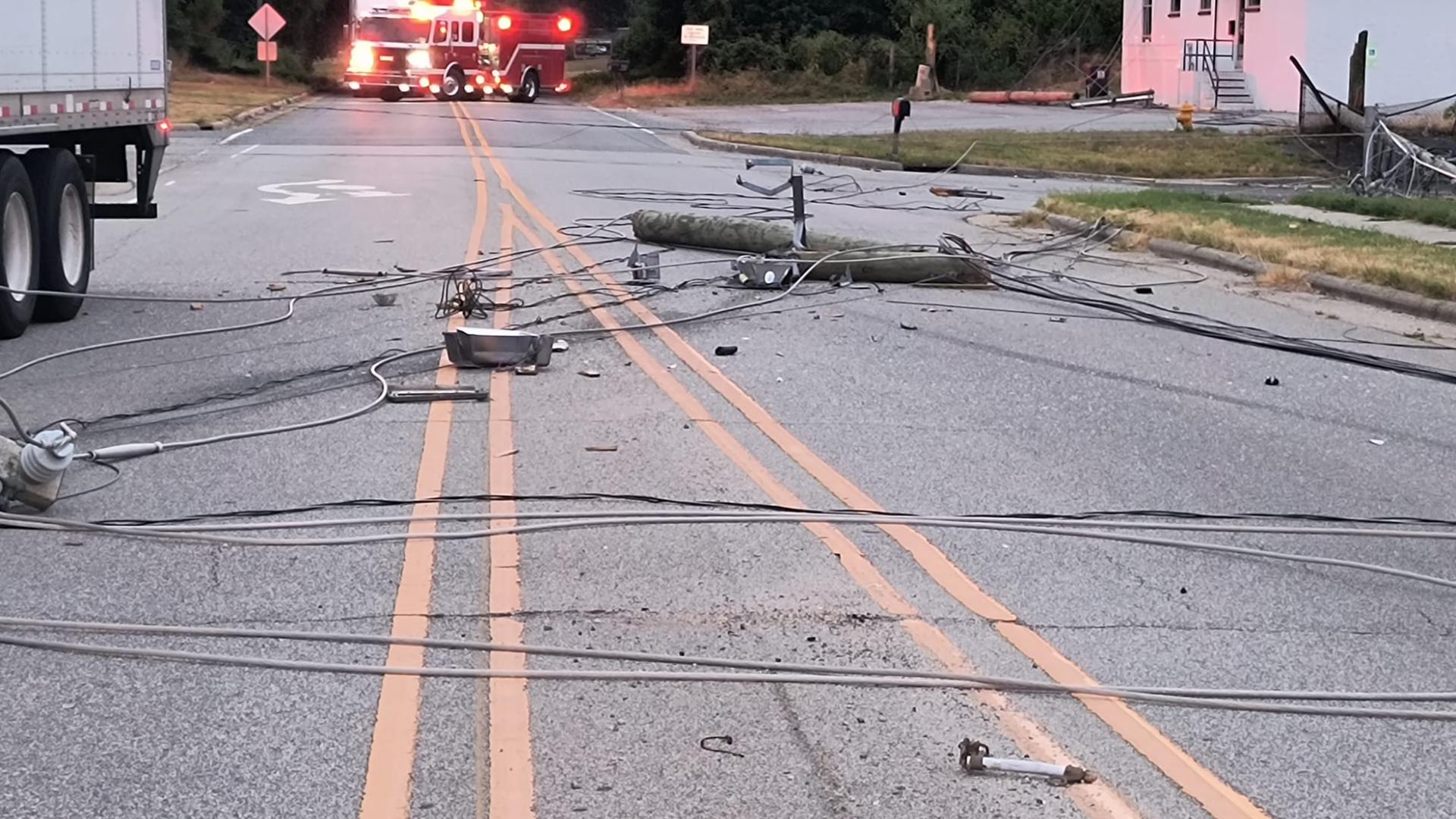 Road closed for hours as crews fix downed power lines | wfmynews2.com