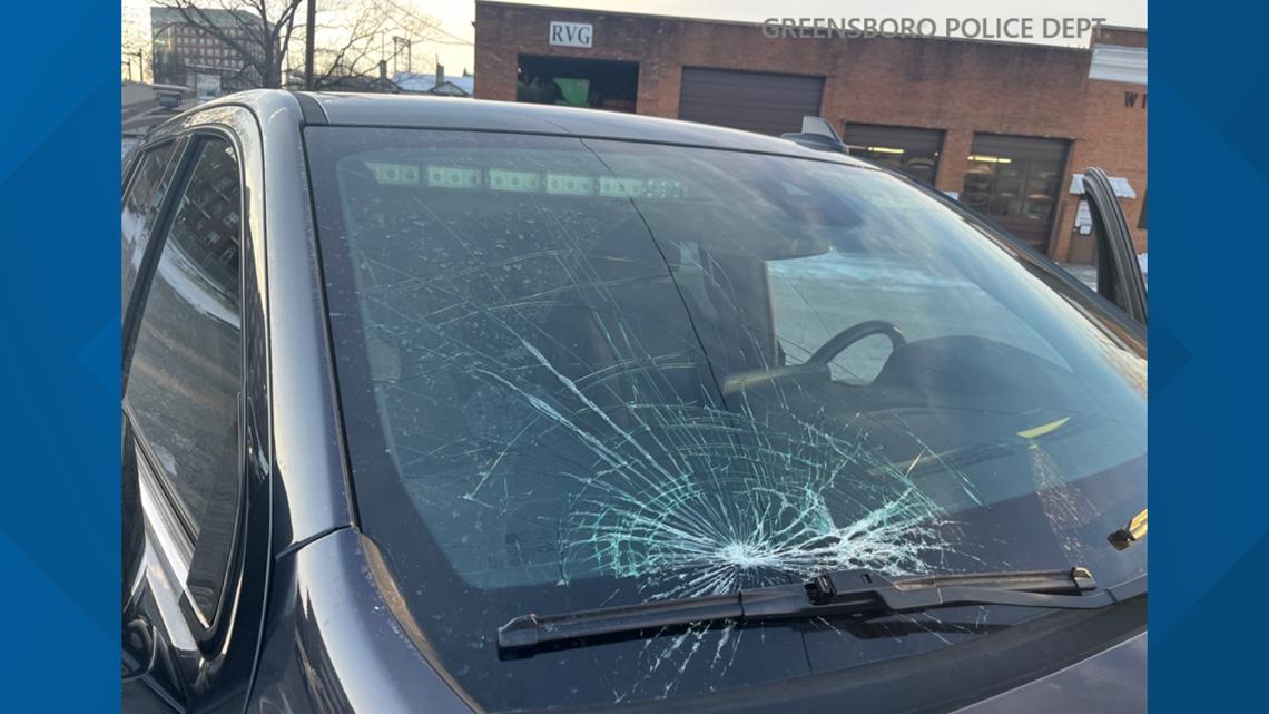 Flying ice hits a Greensboro Police Cruiser. Not cleaning off your car ...