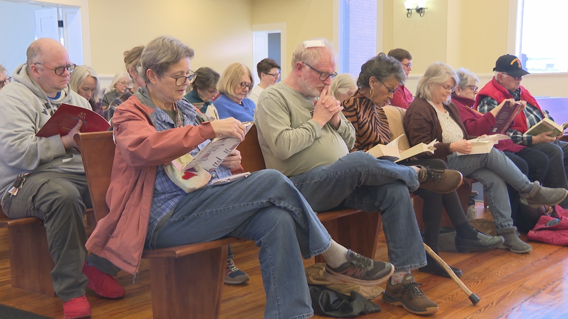 Randolph County residents silently protest over library board dismissal ...