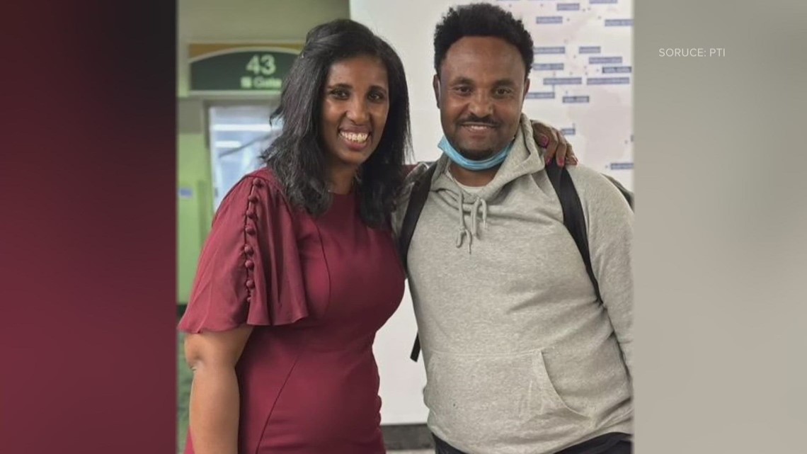 Romantic Reunion | Husband and wife reunite at PTI Airport | wfmynews2.com