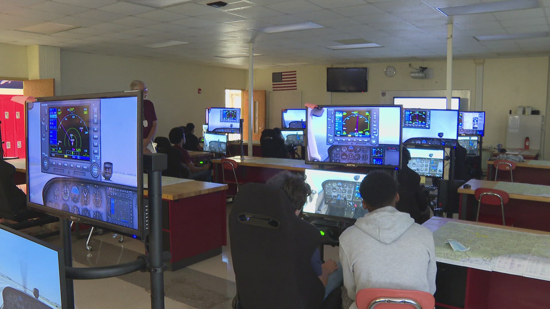 JetZero representatives tour Andrews High's aviation shop, flight ...